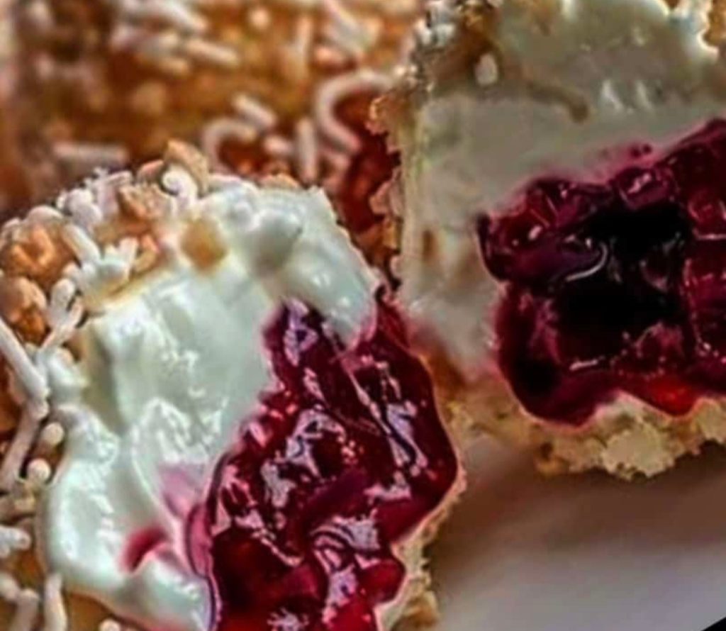 Irresistible Cream and Berry-Filled Pastry Balls: A Sweet Delight for ...